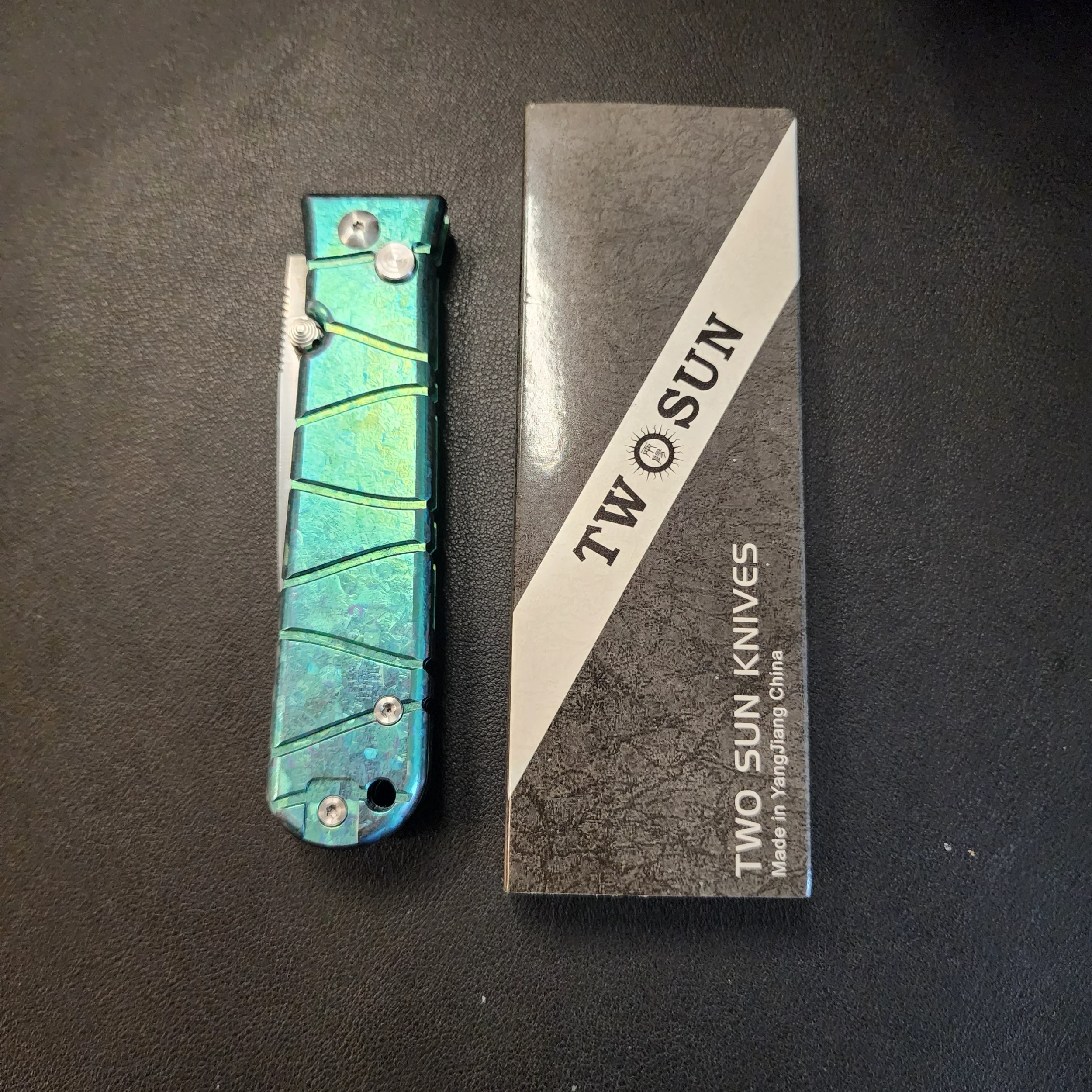 Bladebinge - TS409 M390 Green Crystalized Titanium Handles