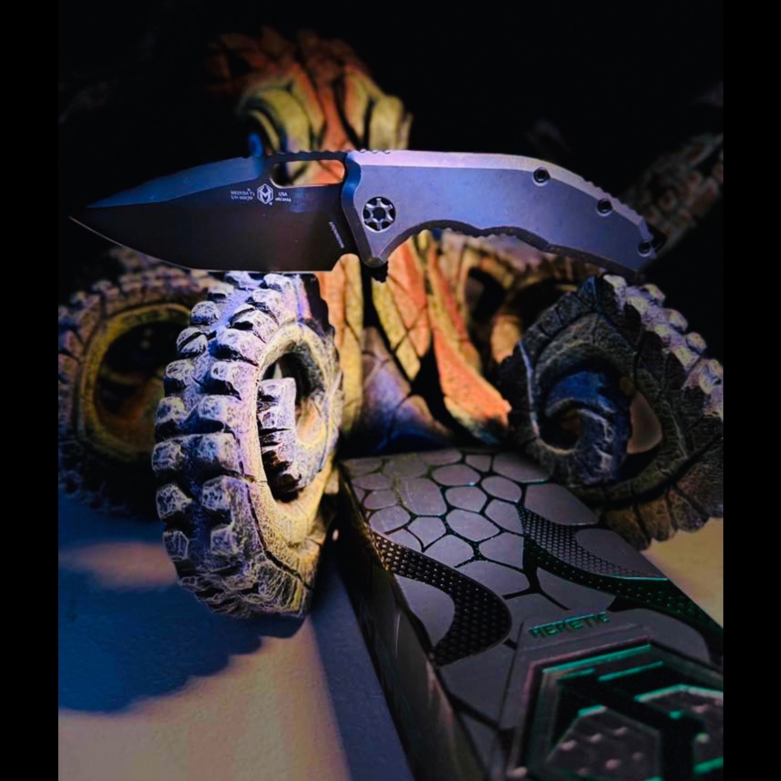 Bladebinge - Heretic Knives Medusa Manual Tanto Antique Blue Titanium ...