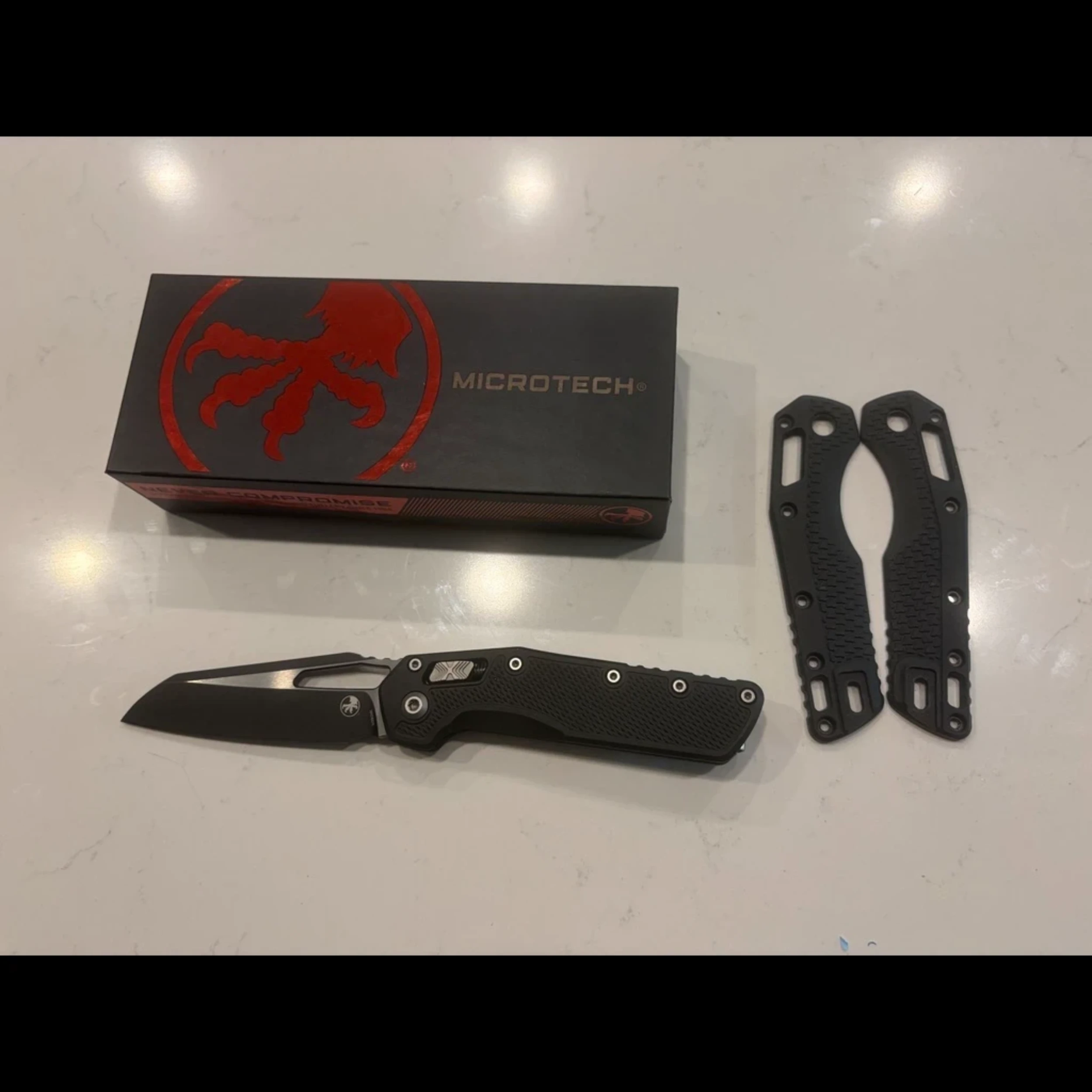 Bladebinge - Microtech MSI RAM-LOK Plain Edge, Black Original Goat ...